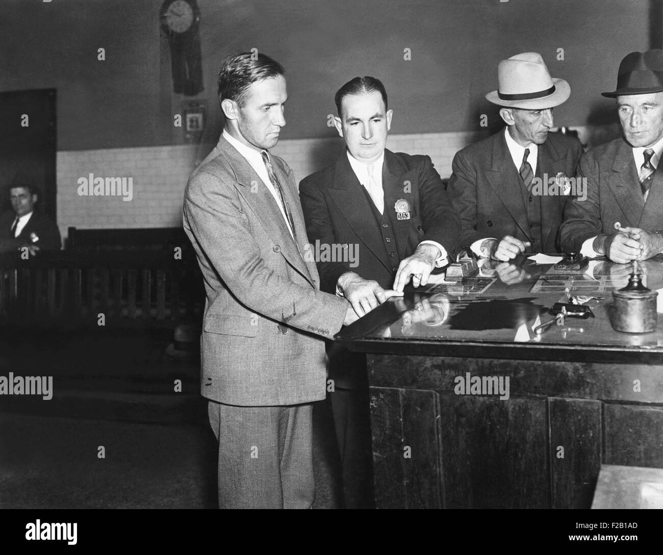 Bruno Hauptmann fingerprinted after his arrest for the possession of ...