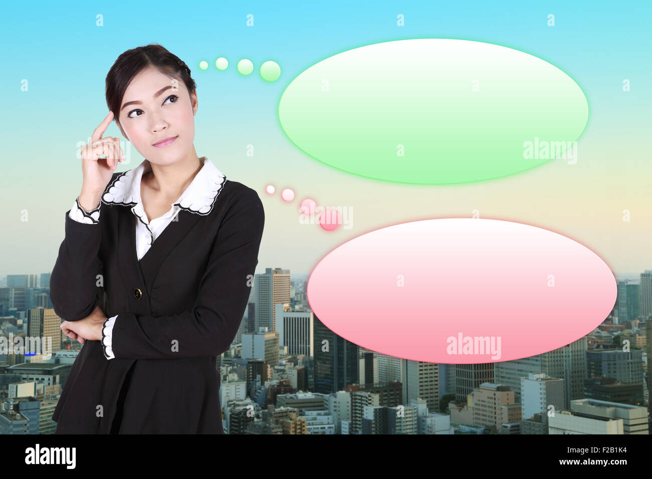 Thinking business woman with many ideas in empty bubble with city ...