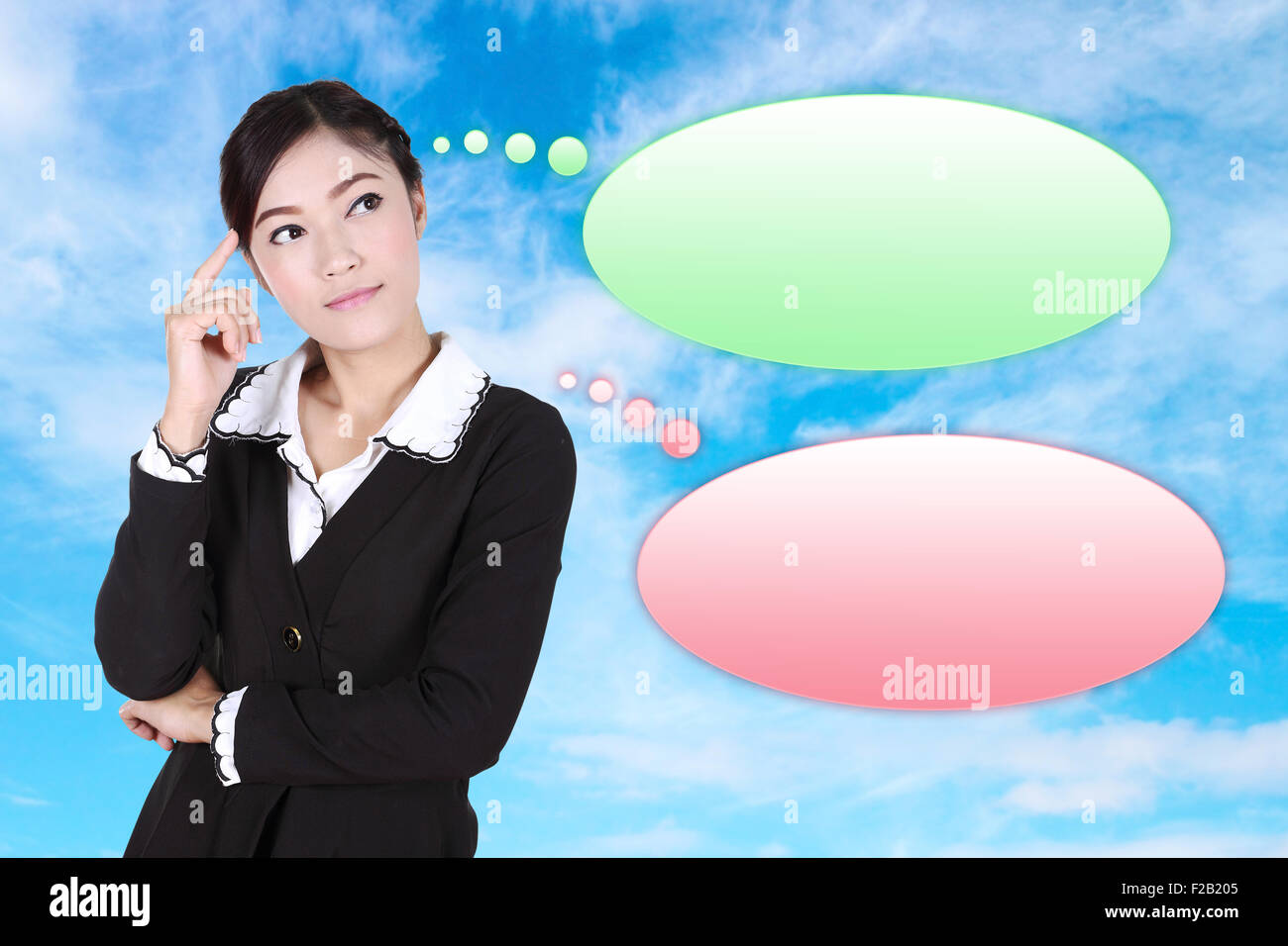 Thinking business woman with many ideas in empty bubble with blue sky ...