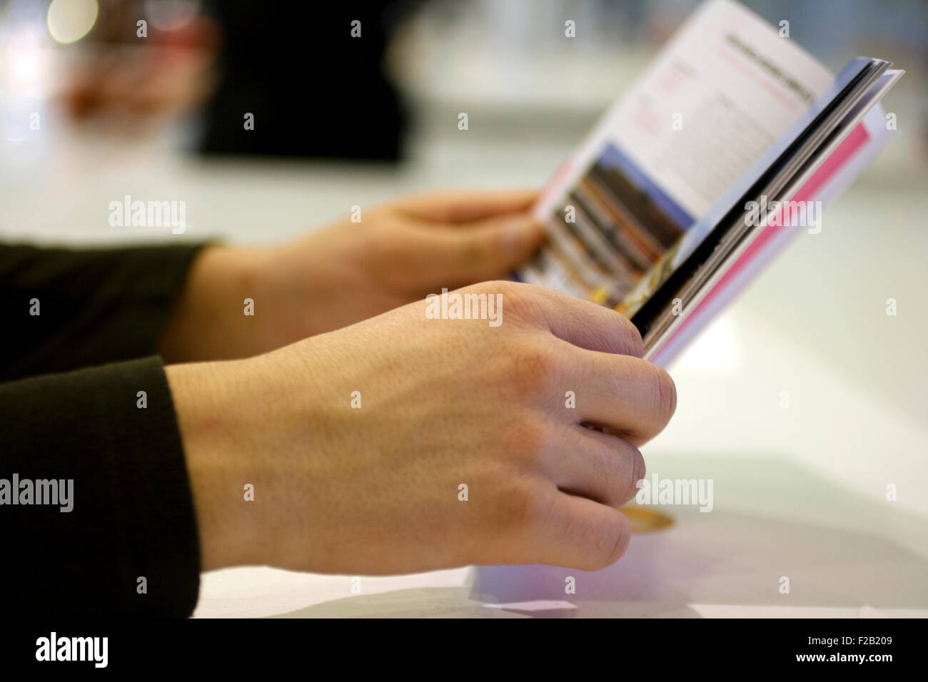 Hands of Man that Reading a book Stock Photo - Alamy