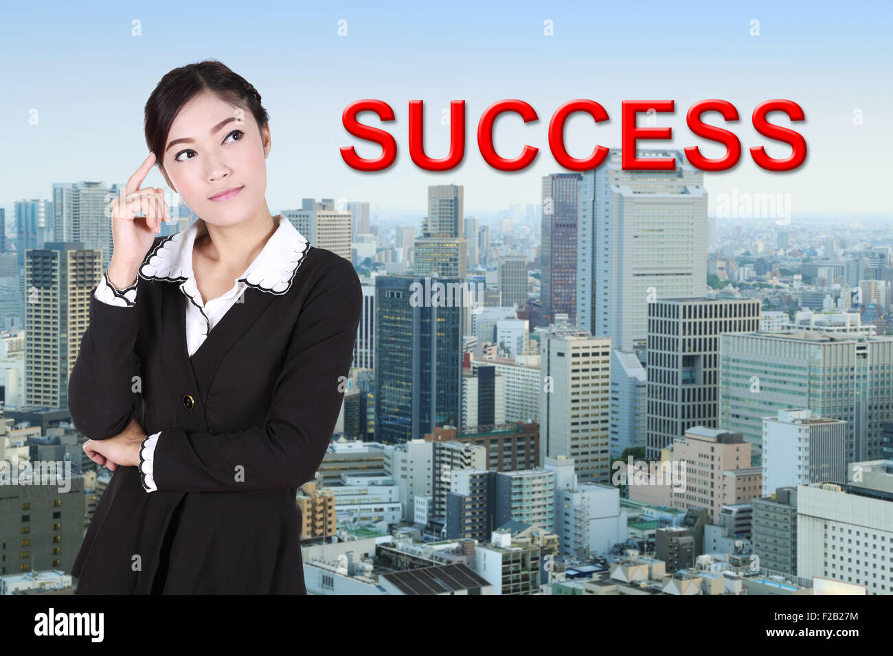business woman thinking about "success" with city background Stock ...