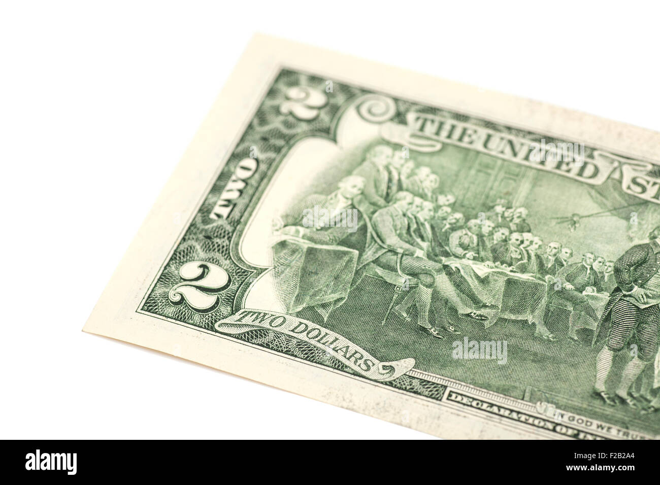 Two dollars bill on white background Stock Photo - Alamy