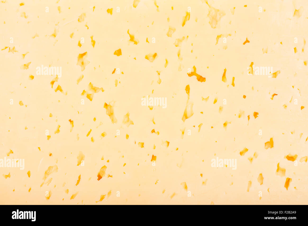 Fresh yellow cheese background Stock Photo - Alamy
