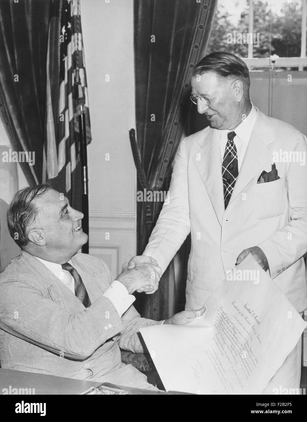 President Franklin Roosevelt congratulates his new Navy Secretary ...