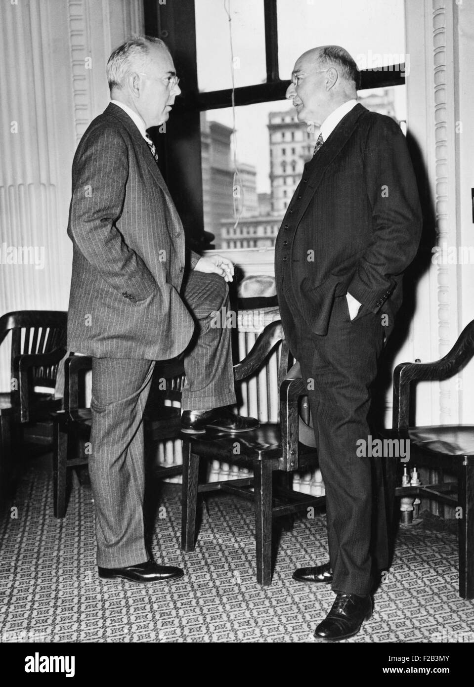Pierre DuPont, noted Financier (right), talking with his lawyer, James ...