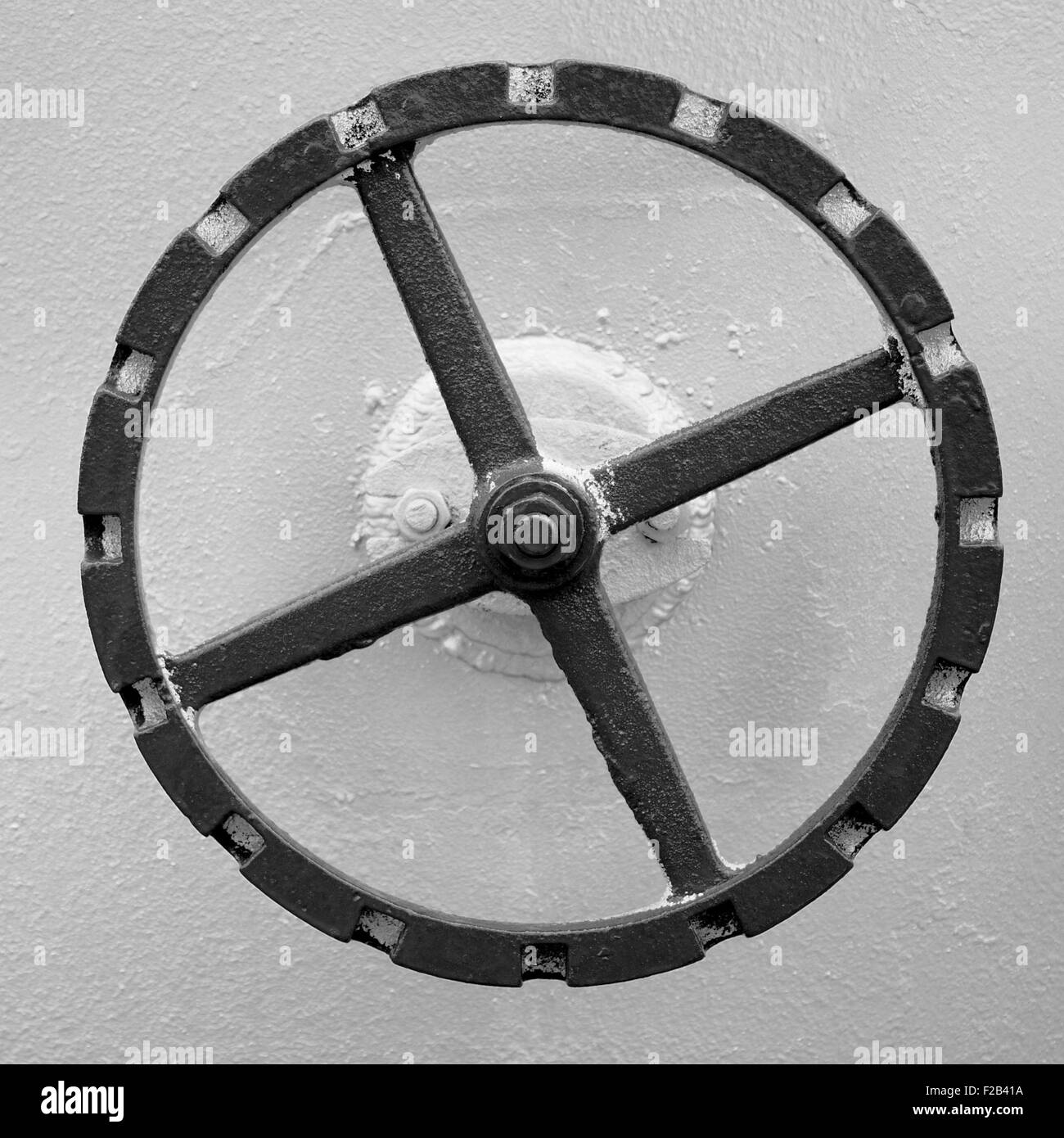 old hand wheel on the wall of tank Stock Photo - Alamy