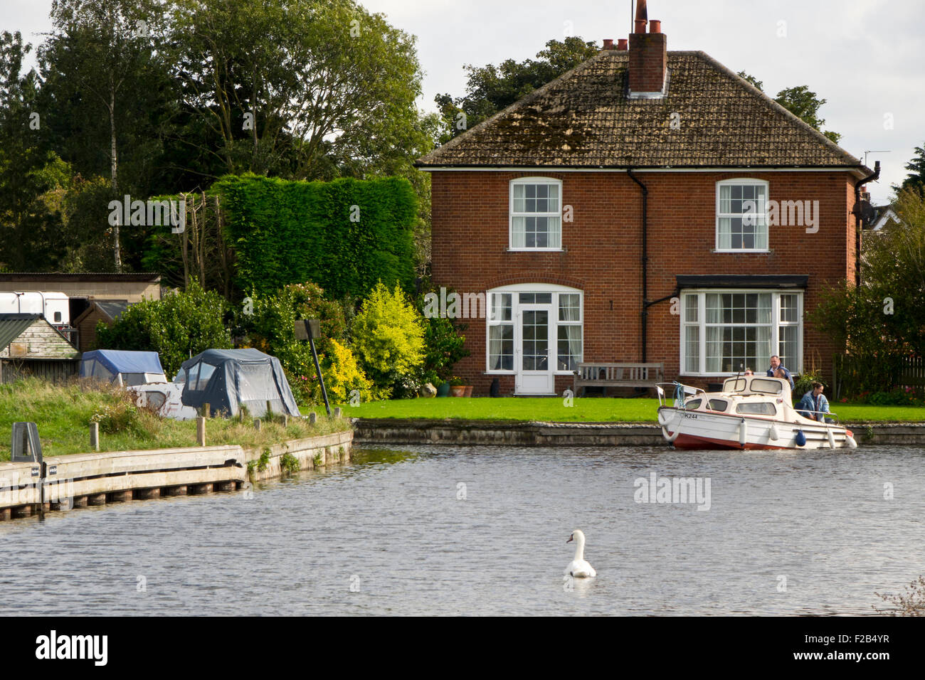 house on river Stock Photo - Alamy