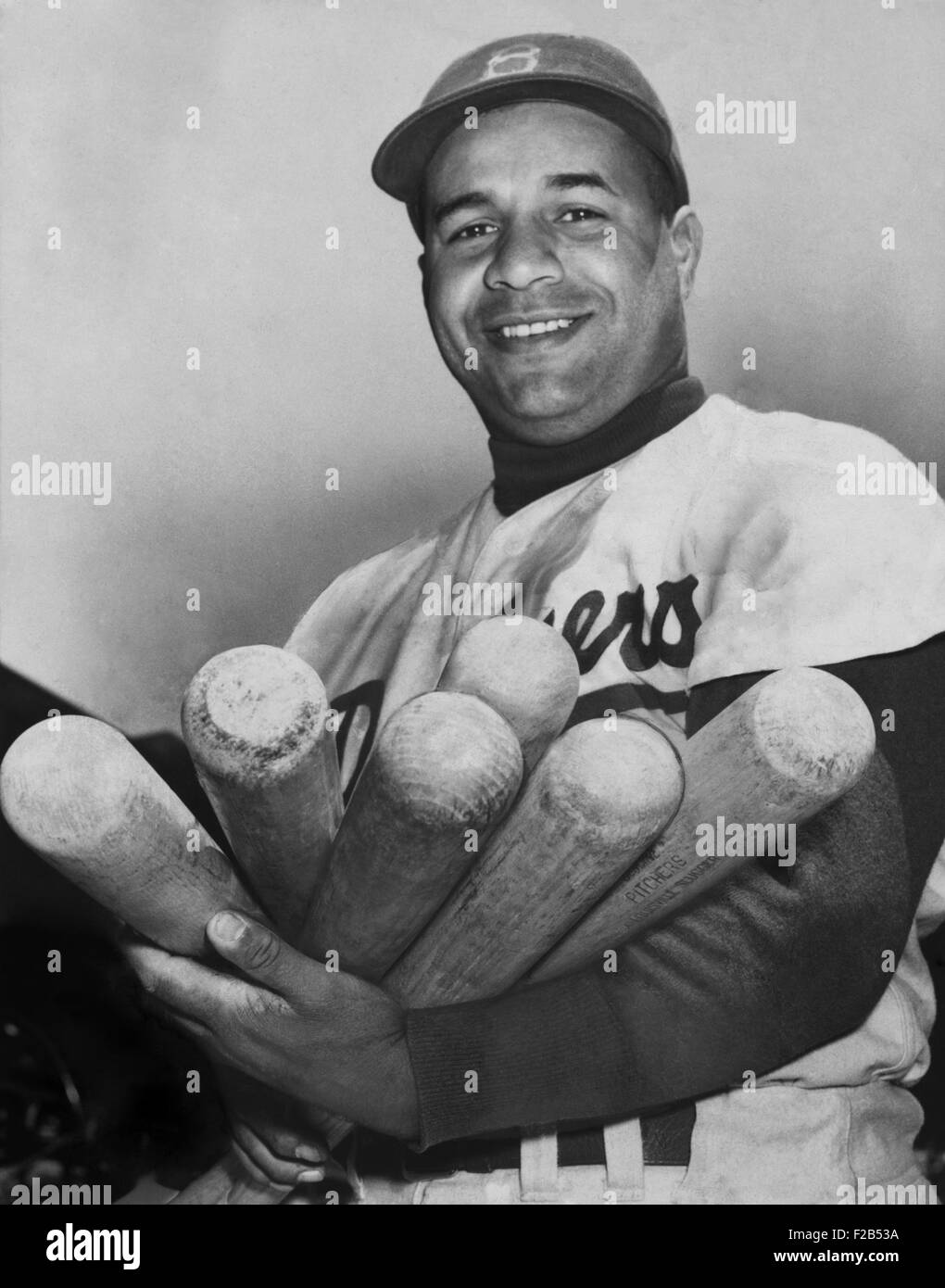 Roy Campanella, catcher for the Brooklyn Dodgers, holding six bats ...