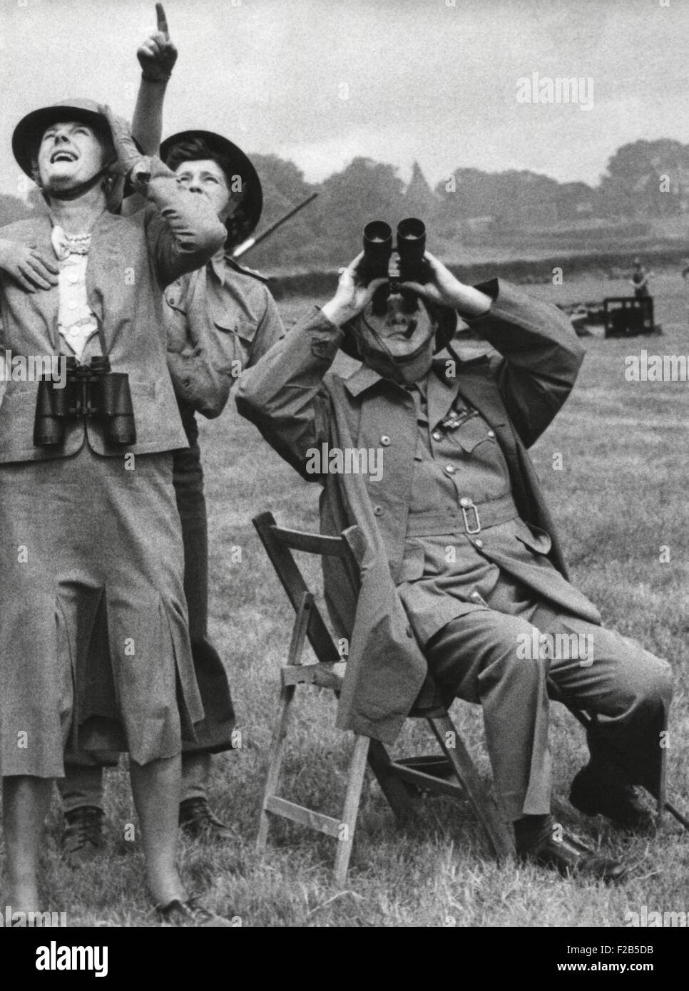 Prime Minister and Mrs. Churchill watching a fighter intercept a German ...