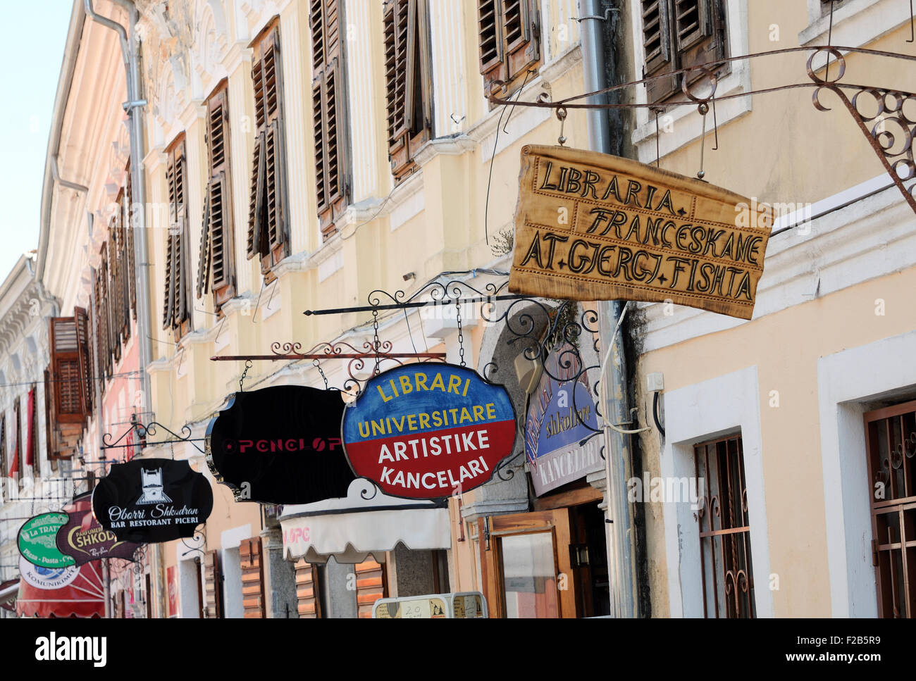 Shop signs in the centre of Shkoder. Shkodër, Albania Stock Photo - Alamy