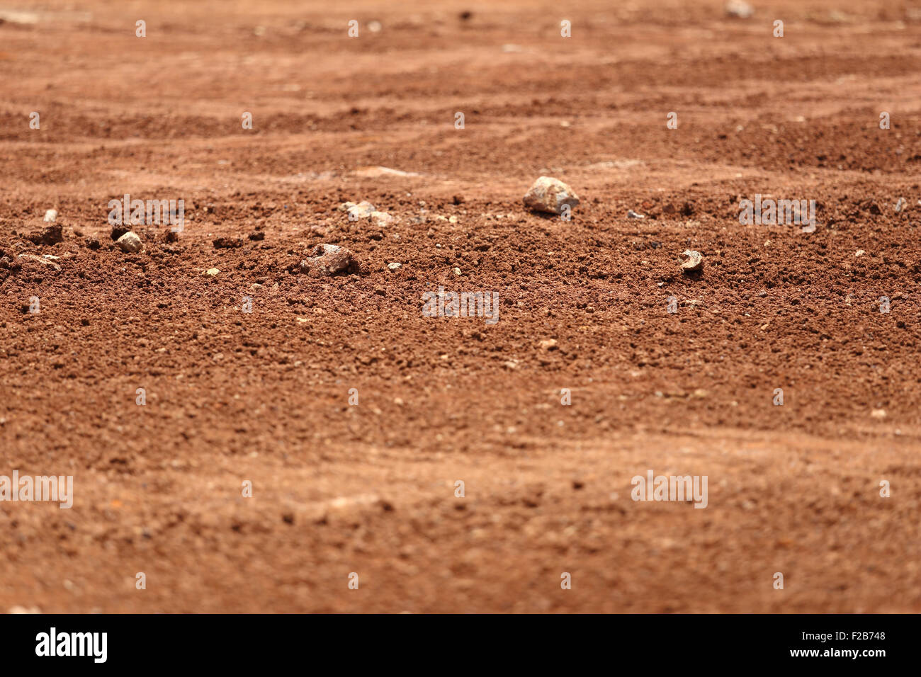 Tropical laterite soil or red earth background Stock Photo - Alamy
