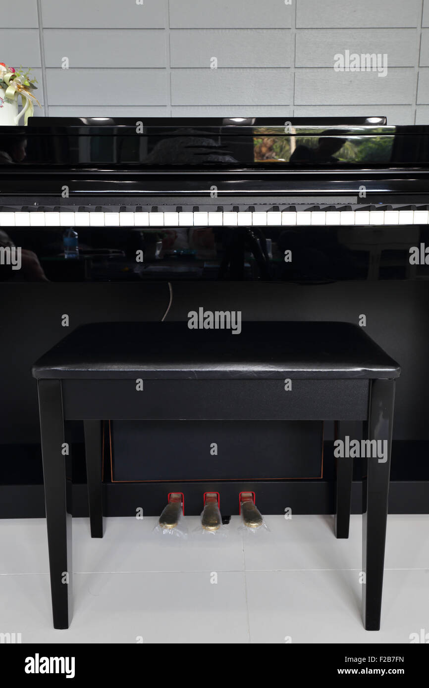 A black electronic piano with piano keys Stock Photo - Alamy