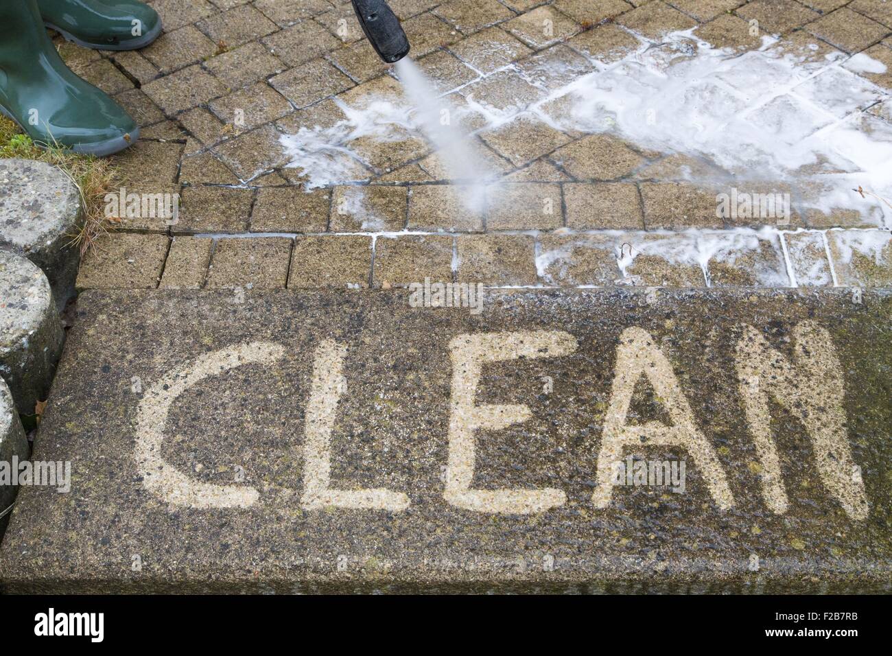 Outdoor floor cleaning with high pressure water jet Stock Photo - Alamy