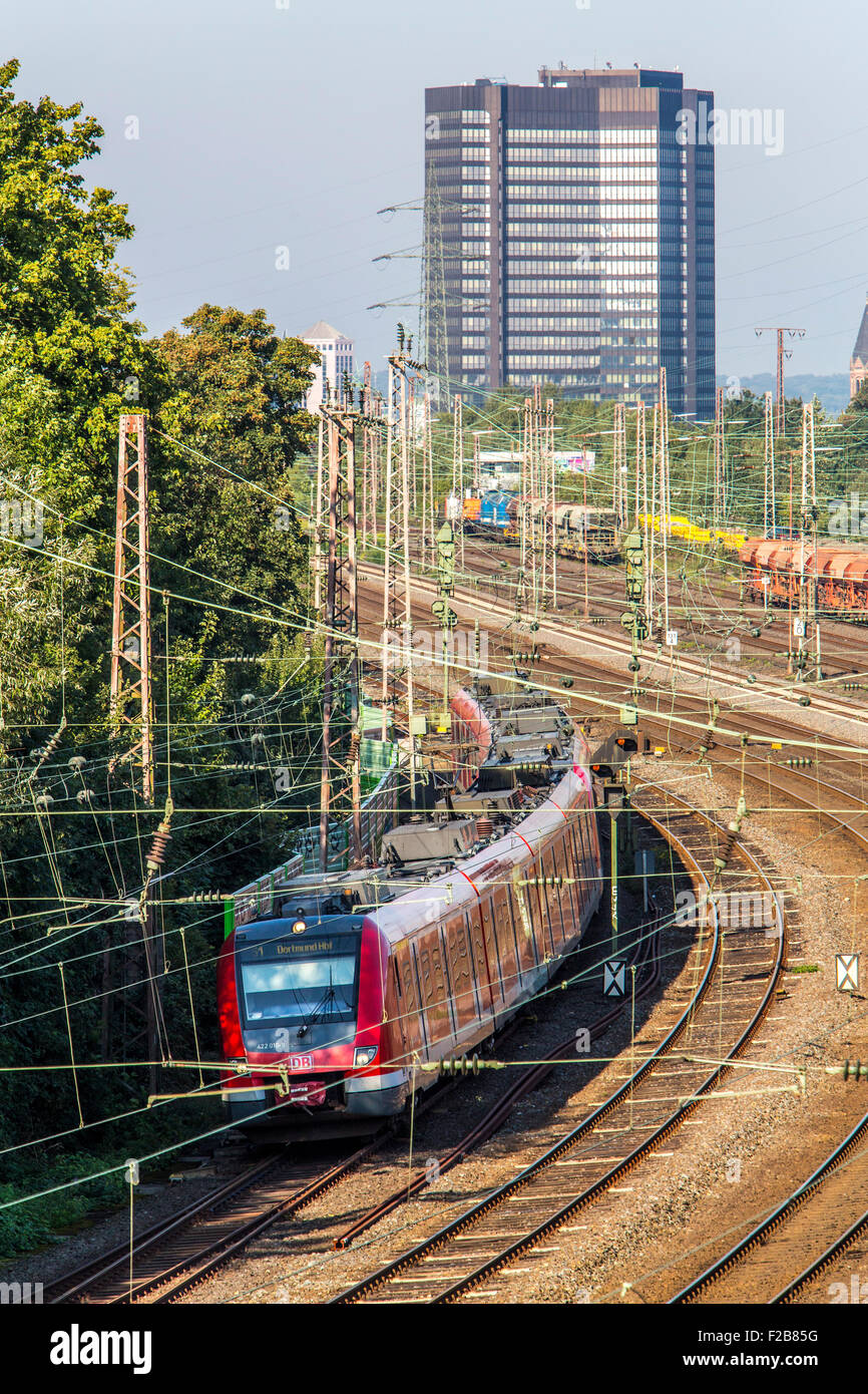 Train approaching Essen main railway station, city hall building Stock ...