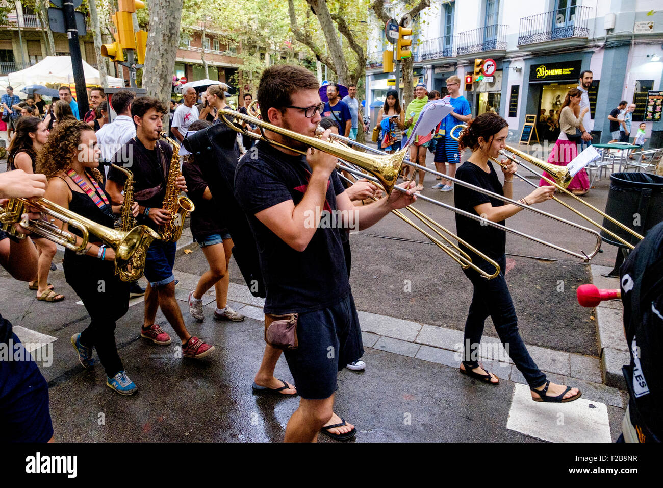 Musicians in a marching band take part in a fiesta in the Rambla del ...