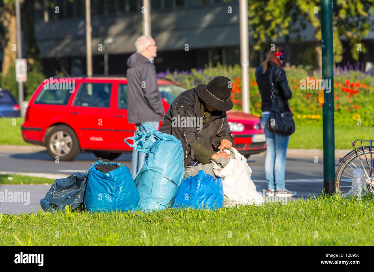 Homeless person, their belongings in plastic sacks Stock Photo - Alamy