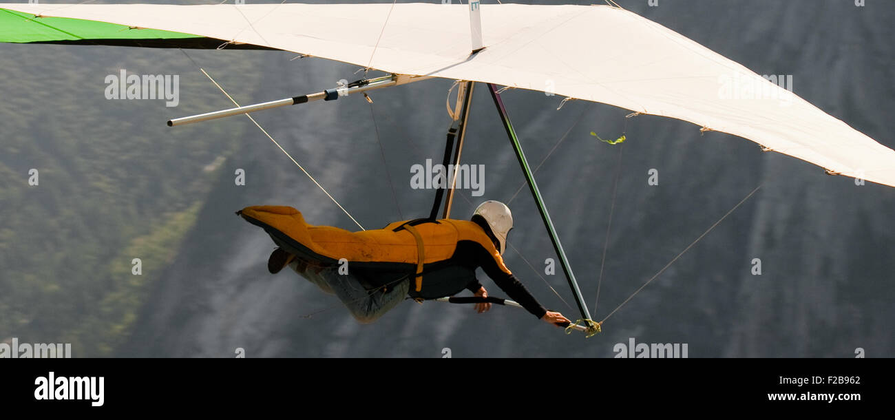 Tourist hang-gliding over a valley, Glacier Point, Yosemite Valley ...