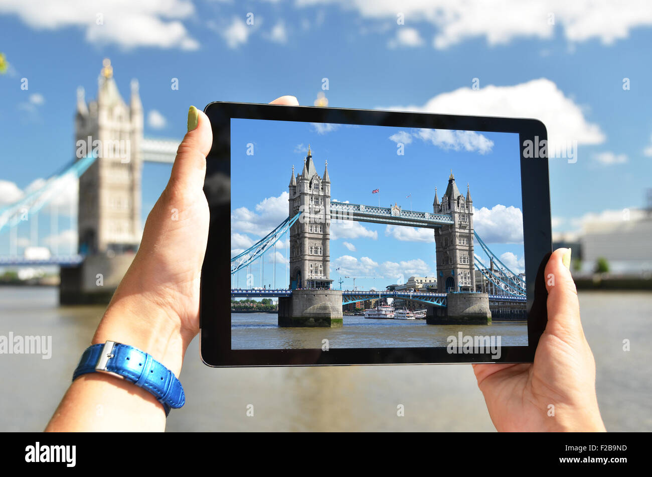 Tower bridge on the screen of a tablet Stock Photo - Alamy