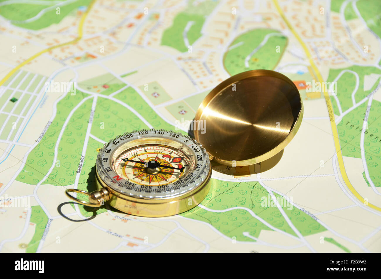Compass on a map Stock Photo - Alamy