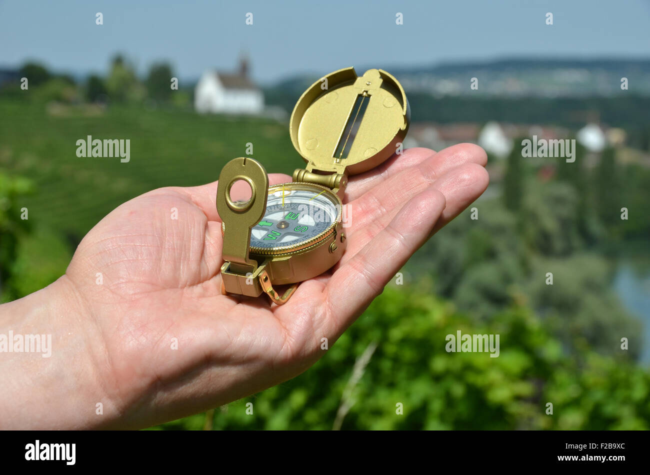 Compass in the hand Stock Photo - Alamy
