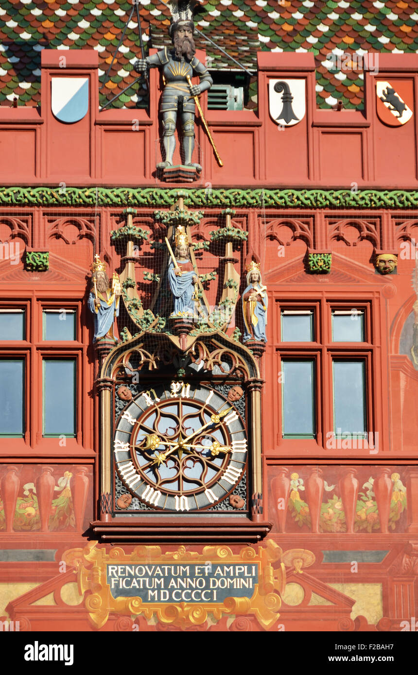 Clock on the wall of the city hall in Basel, Switzerland Stock Photo ...