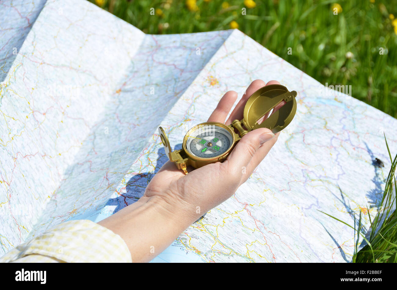Compass in the hand Stock Photo - Alamy