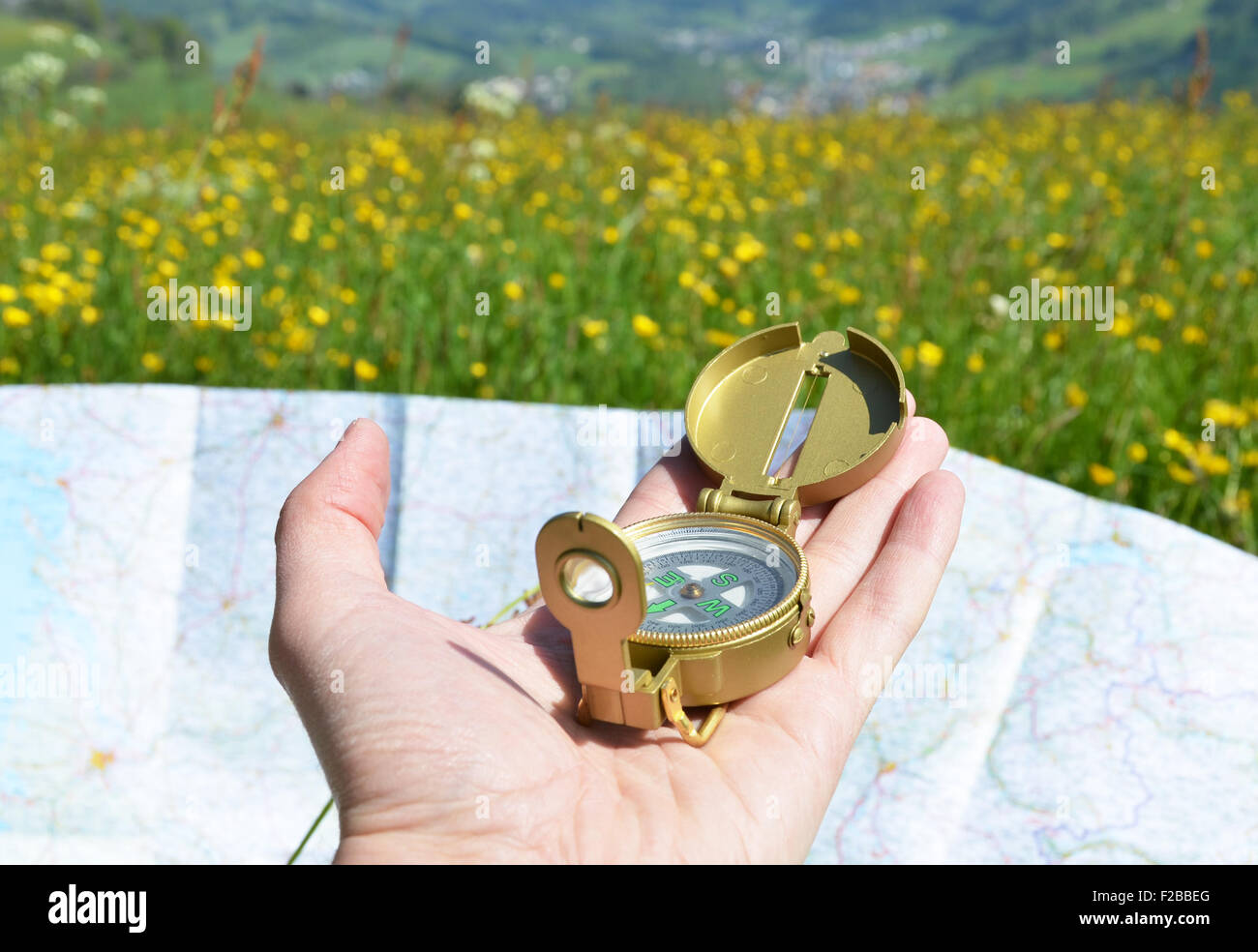 Compass in the hand Stock Photo - Alamy