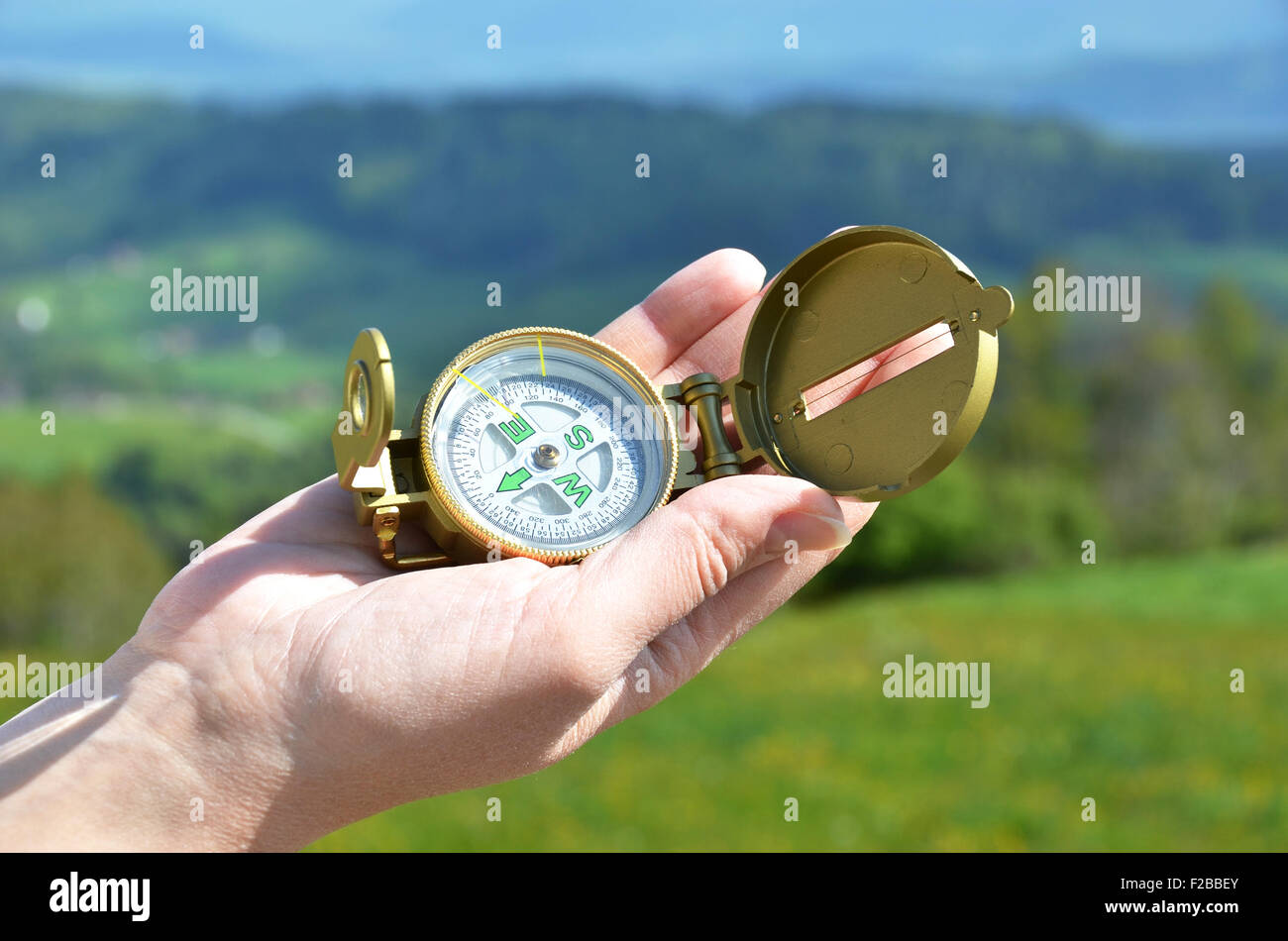Compass in the hand Stock Photo - Alamy