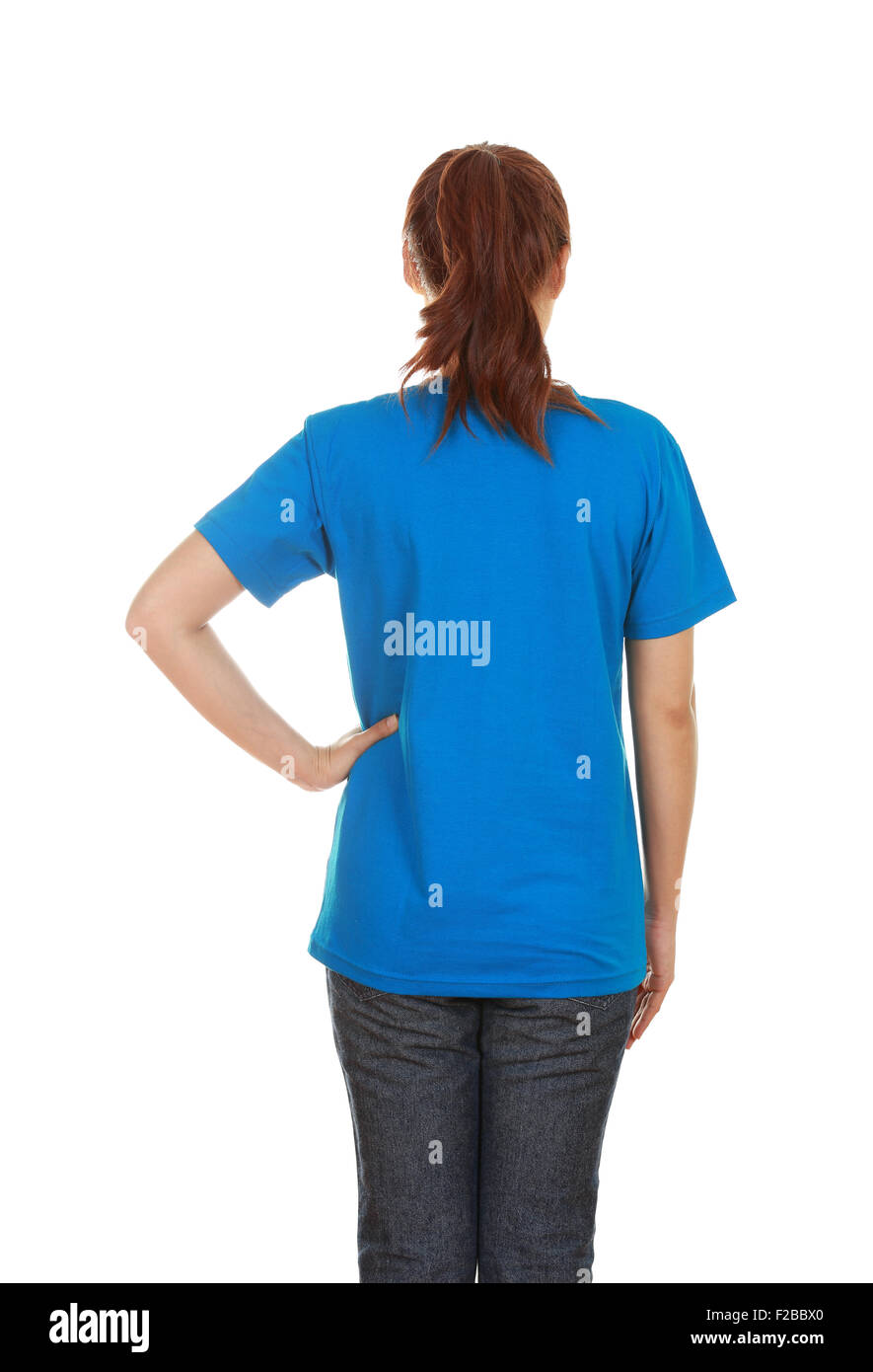 female with blank blue t-shirt (back side) isolated on white background ...