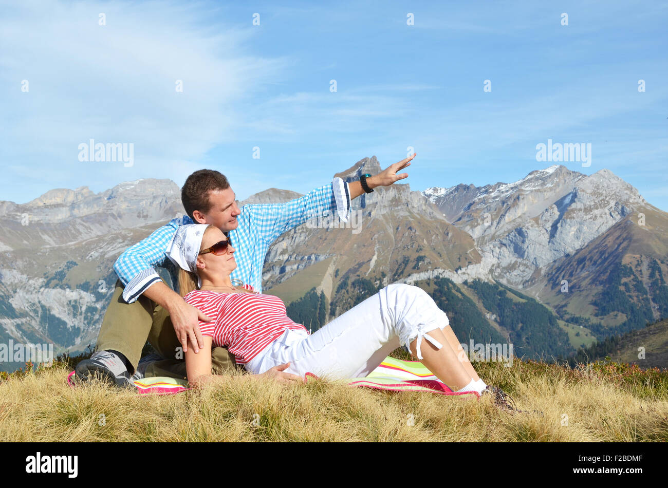 A couple enjoying Alpine panorama. Switzerland Stock Photo - Alamy