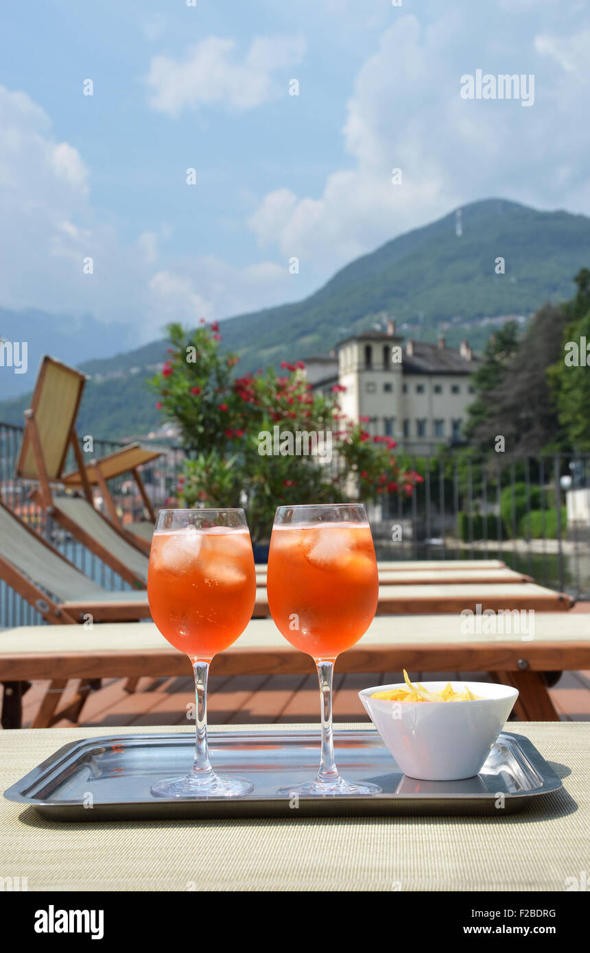Traditional Italian Spritz cocktail against lake Como, Italy Stock ...