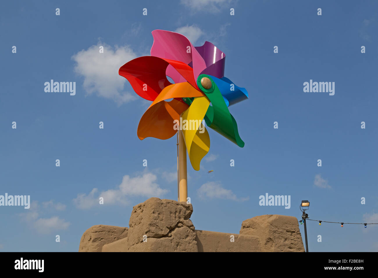 A sculpture of a giant pinwheel at Banksy's exhibition Dismaland in ...