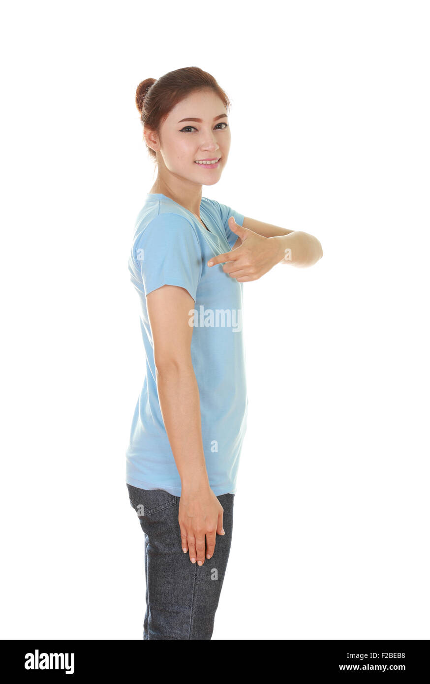 young beautiful female with blue t-shirt (side view) isolated on white ...