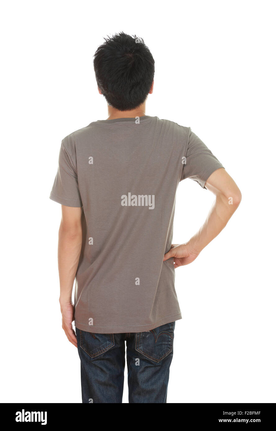 man with blank brown t-shirt (back side) isolated on white background ...