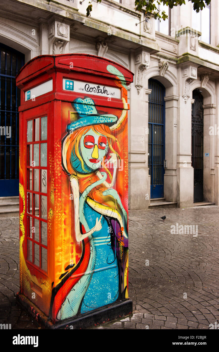 Old style telephone box in Porto painted by street artist Nuno Costah ...