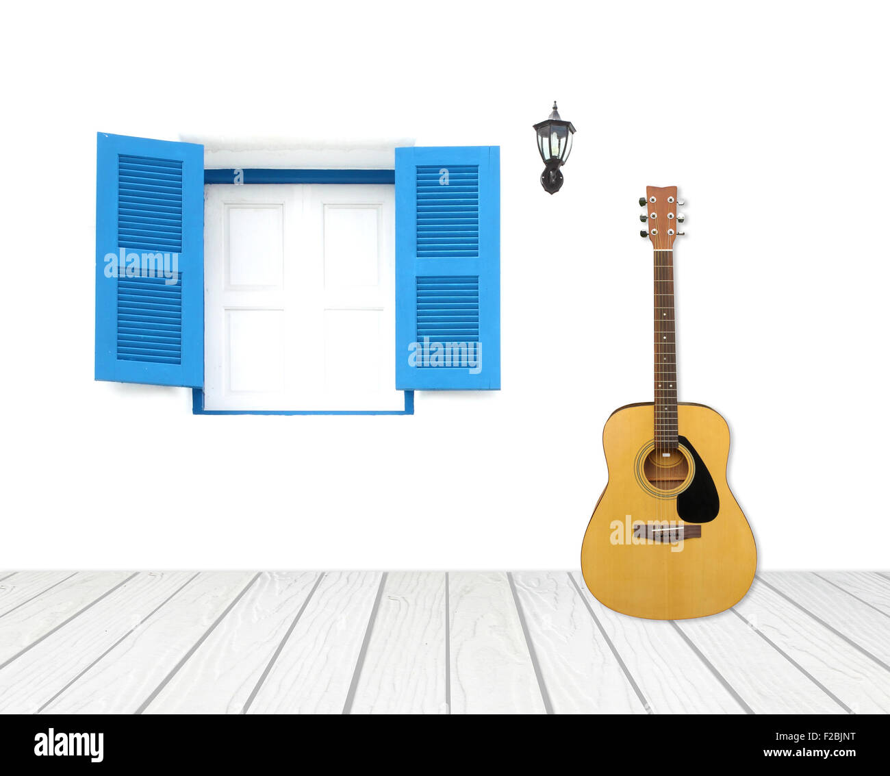 Guitar with window on cement wall and wood floor Stock Photo - Alamy