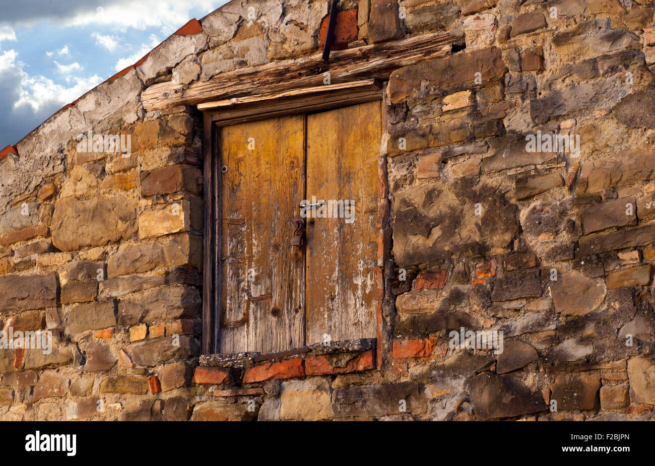 Worn window in a stone house Stock Photo - Alamy