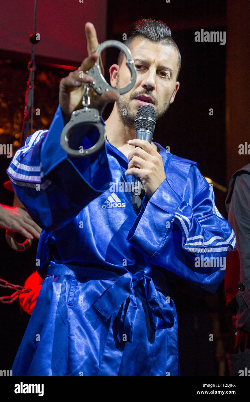 Andrew Basso performs a Houdini-style escape from a water tank. Press ...