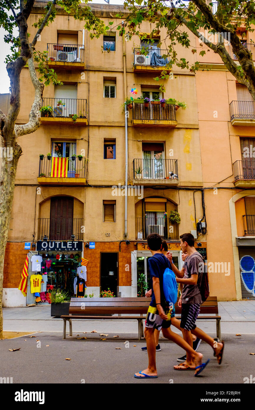 Young men walking in the Rambla del Poblenou, Barcelona, Catalonia ...