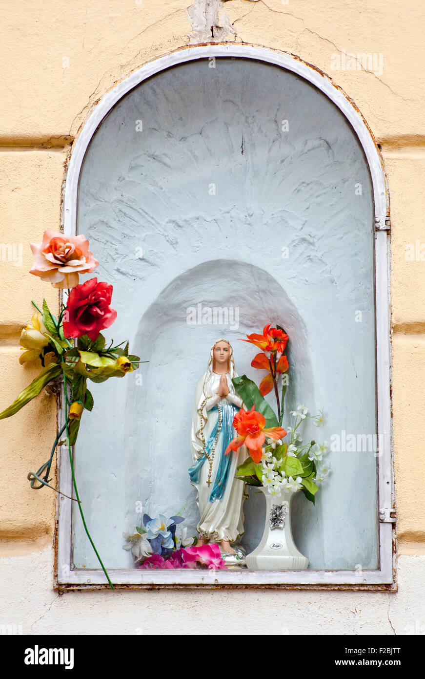 Madonna with flowers hi-res stock photography and images - Alamy