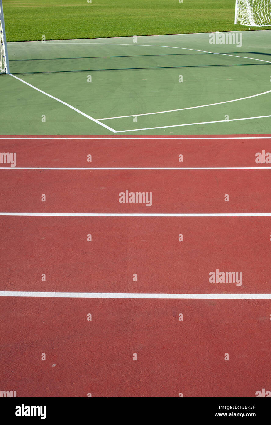 Track and field next to a soccer field Stock Photo - Alamy