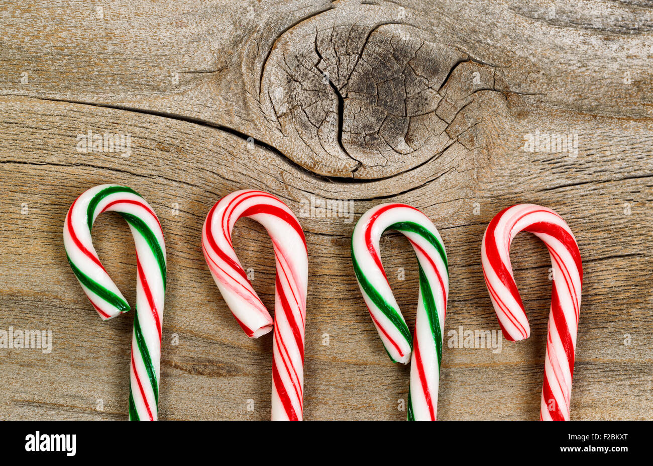 Candy canes on rustic wooden board. Layout in horizontal format Stock ...