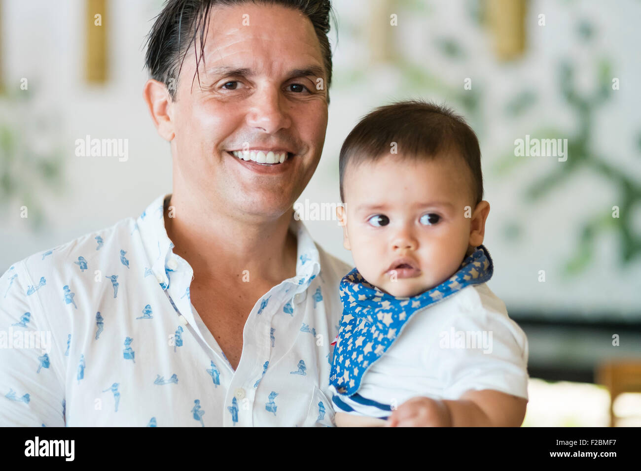 Multi ethnic family of caucasian father and hispanic son Stock Photo ...