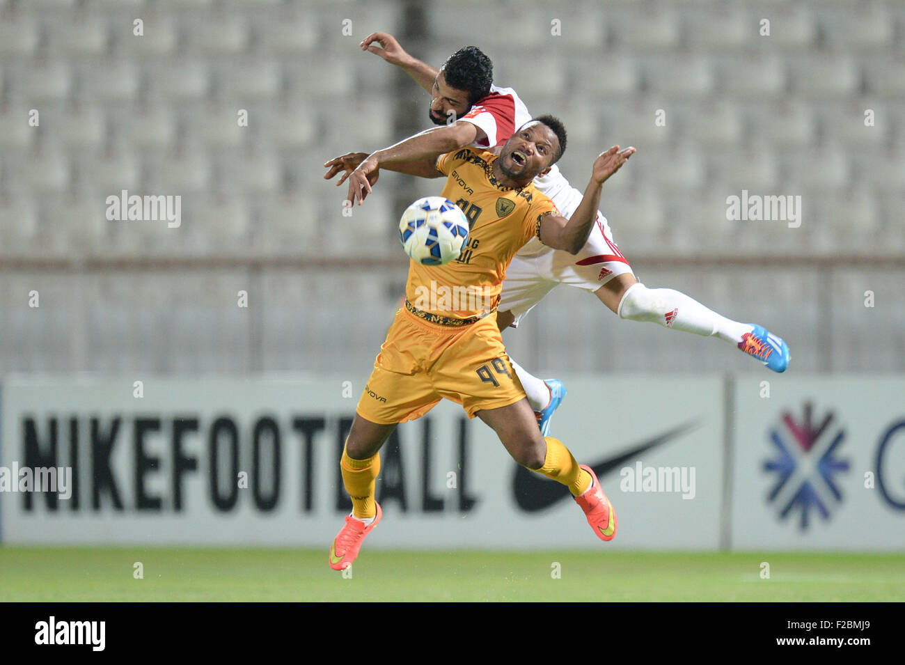 Kuwait City, Kuwait. 15th Sep, 2015. Hamid Osman (R) of Syria's Al ...