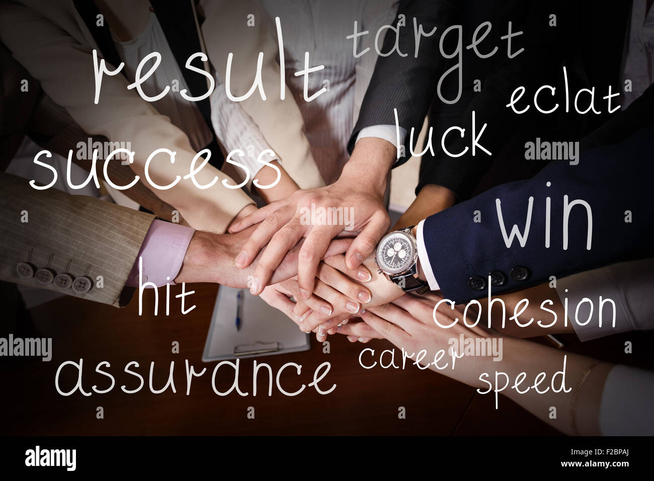 Team of businessmen with folded hands, a symbol of teamwork Stock Photo ...