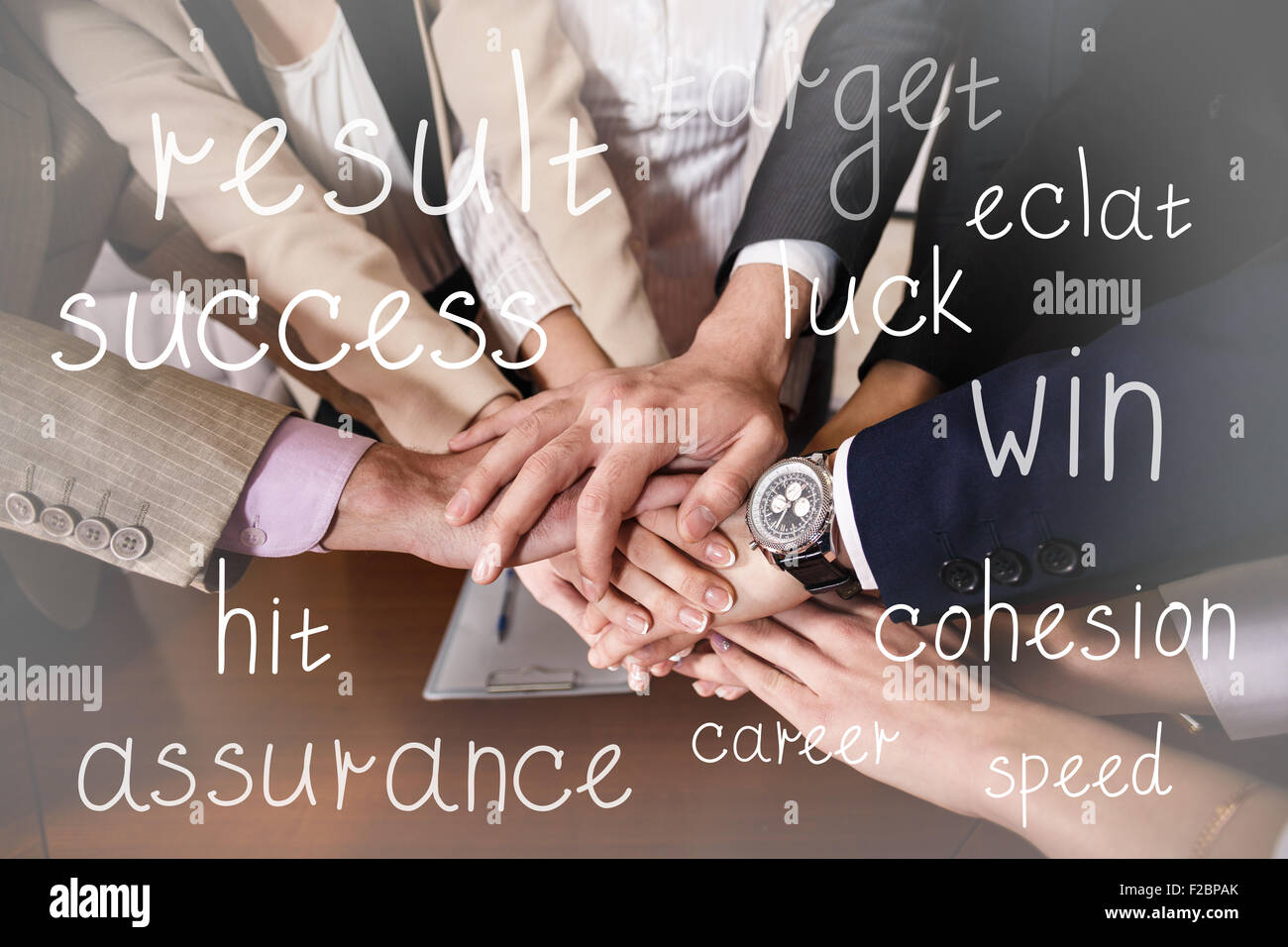 Team of businessmen with folded hands, a symbol of teamwork Stock Photo ...
