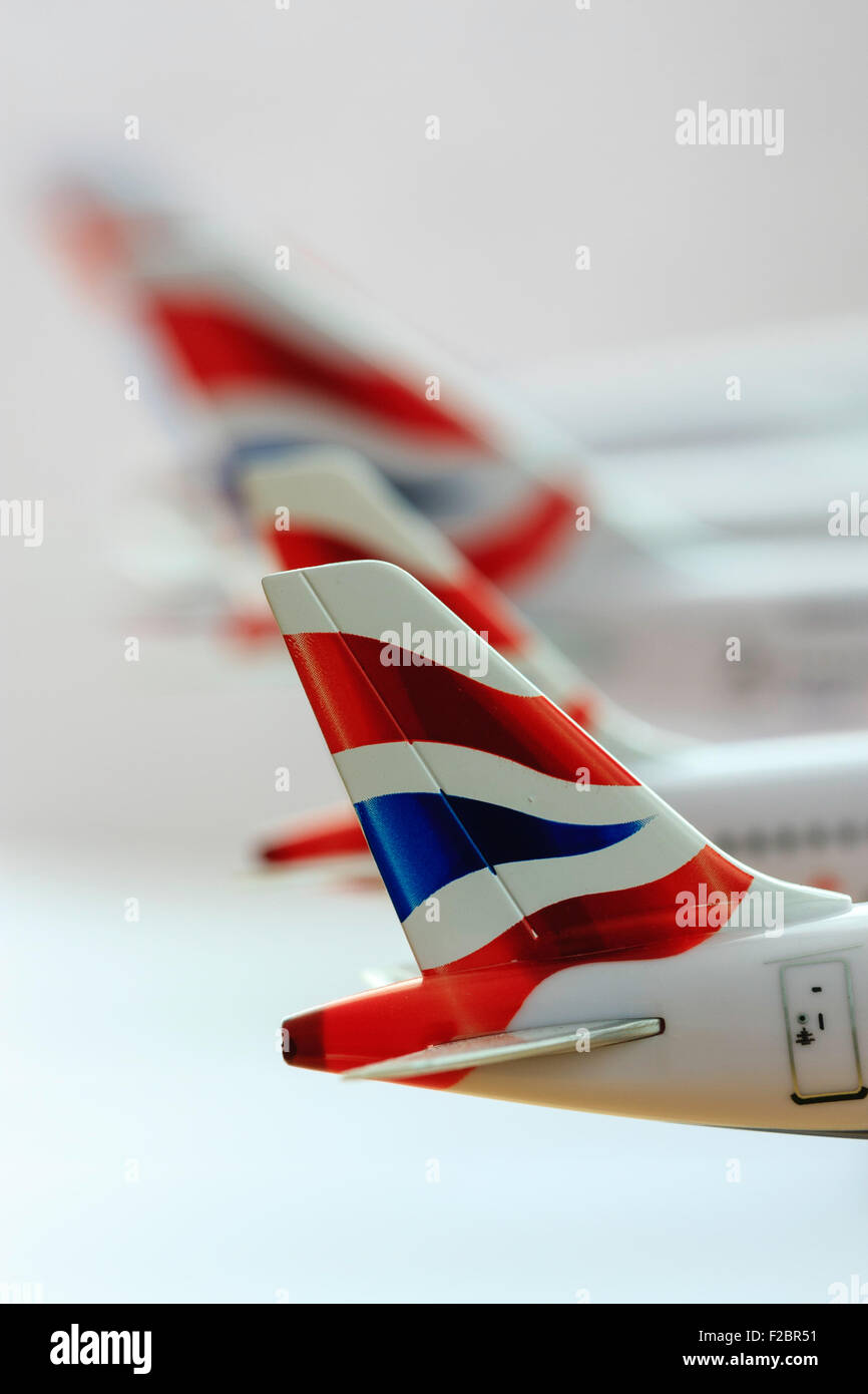 Row of British Airways tail fins of planes with wavy red white and blue ...