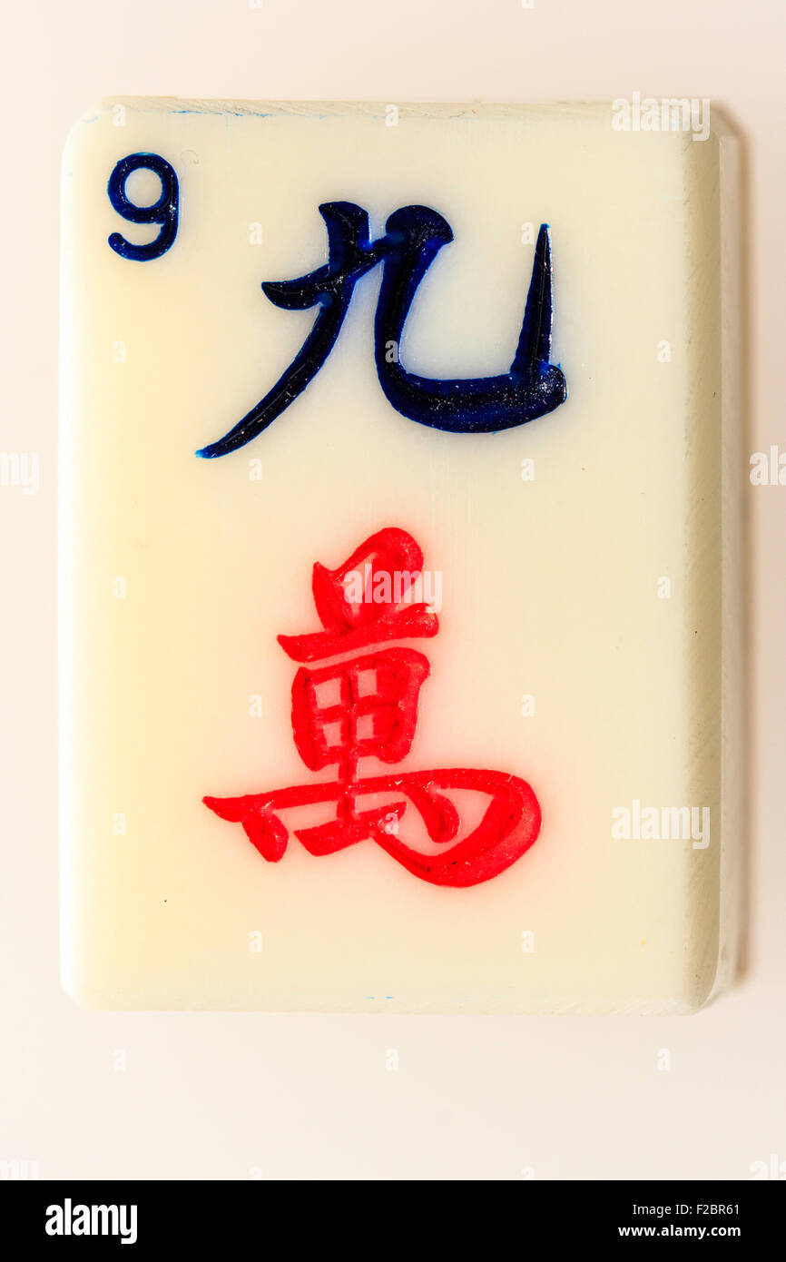 Close up of single card or tile on plain white background from a ...