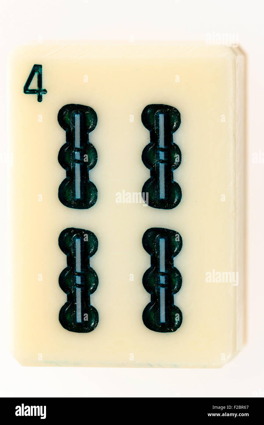 Tile or card from a Mahjong bamboo or bams set, number 4, four. Close ...