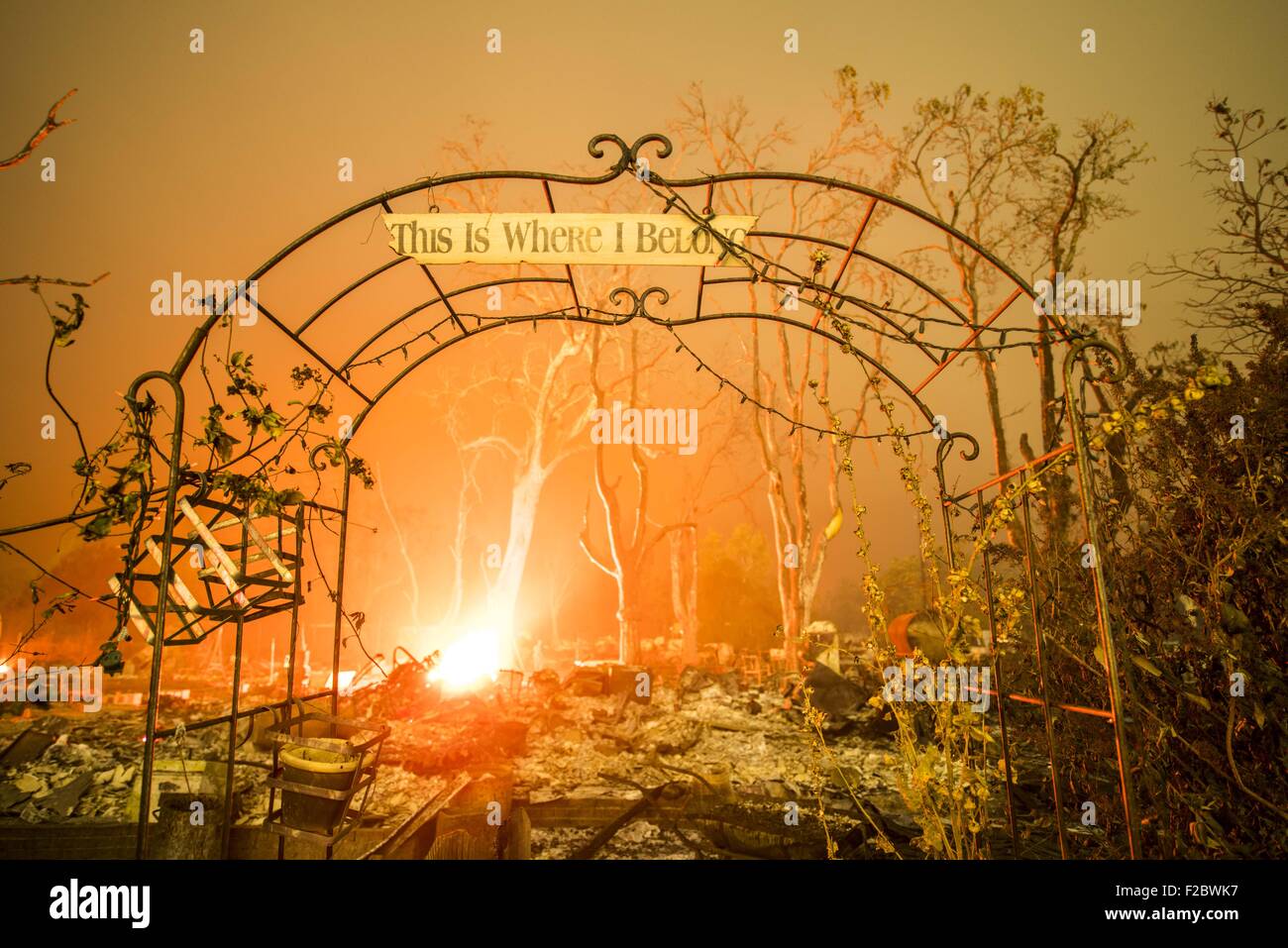 Middletown, CA, USA. 13th Sep, 2015. Flames smolder in the remains of a ...